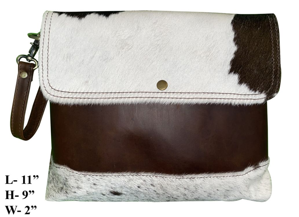 Shiloh Stables and Tack: This leather purse features a brown and white ...
